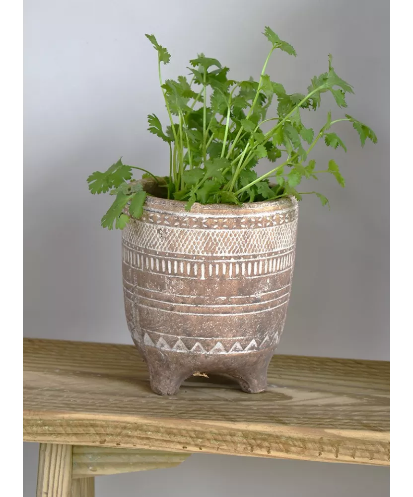 Cache-pot en terre cuite sur pieds beige avec motifs. Petit modèle
